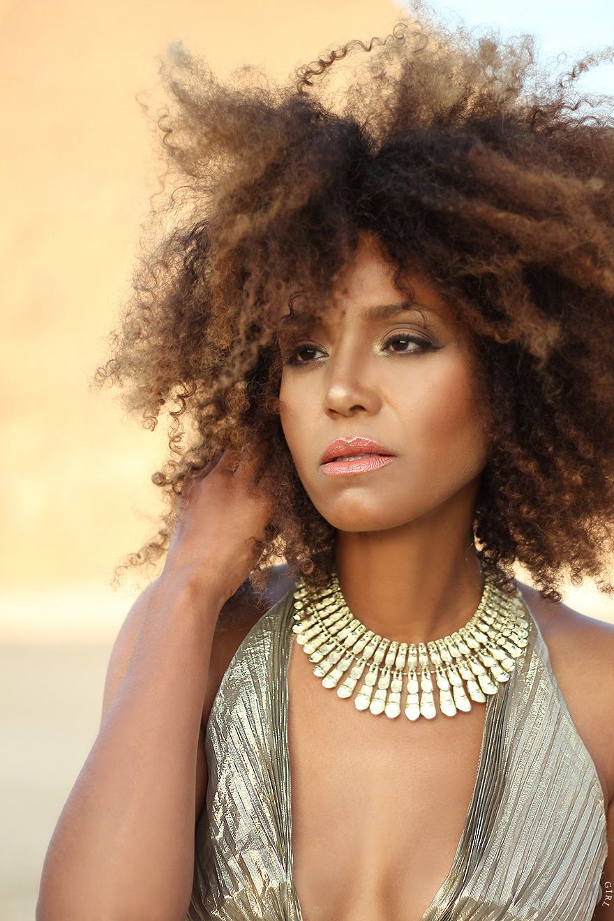 Ndoema in a goddess gold lame gown at the Giza Pyramids in Egypt. | THE ...